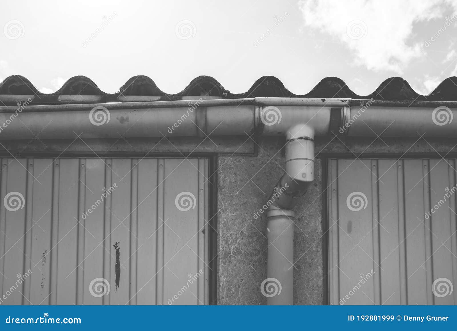 Drainpipe Coupling Below a Galvanised Iron Roof Stock Image - Image of ...