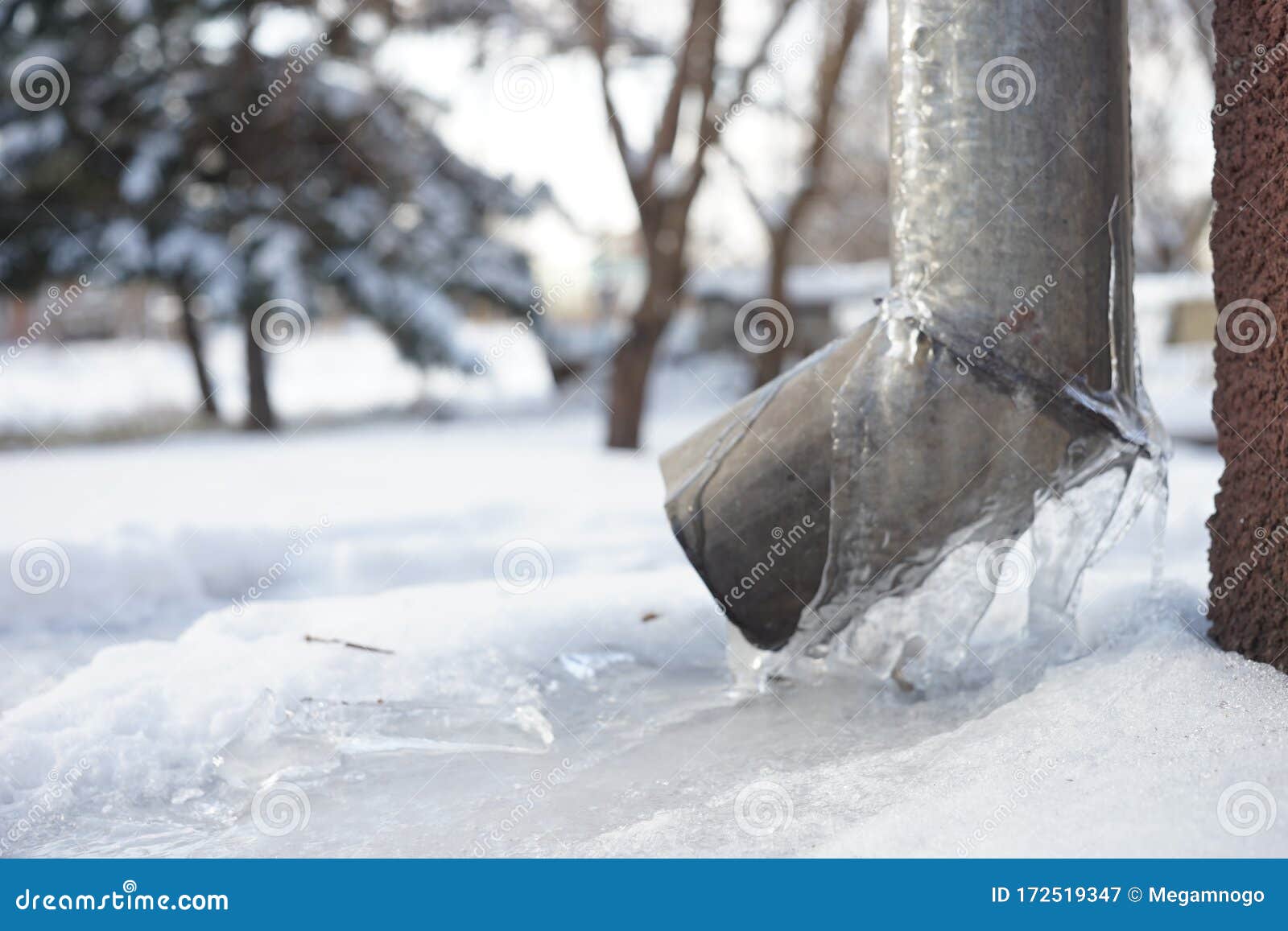 Drainpipe Covered with Ice on the Corner of the House Stock Image ...