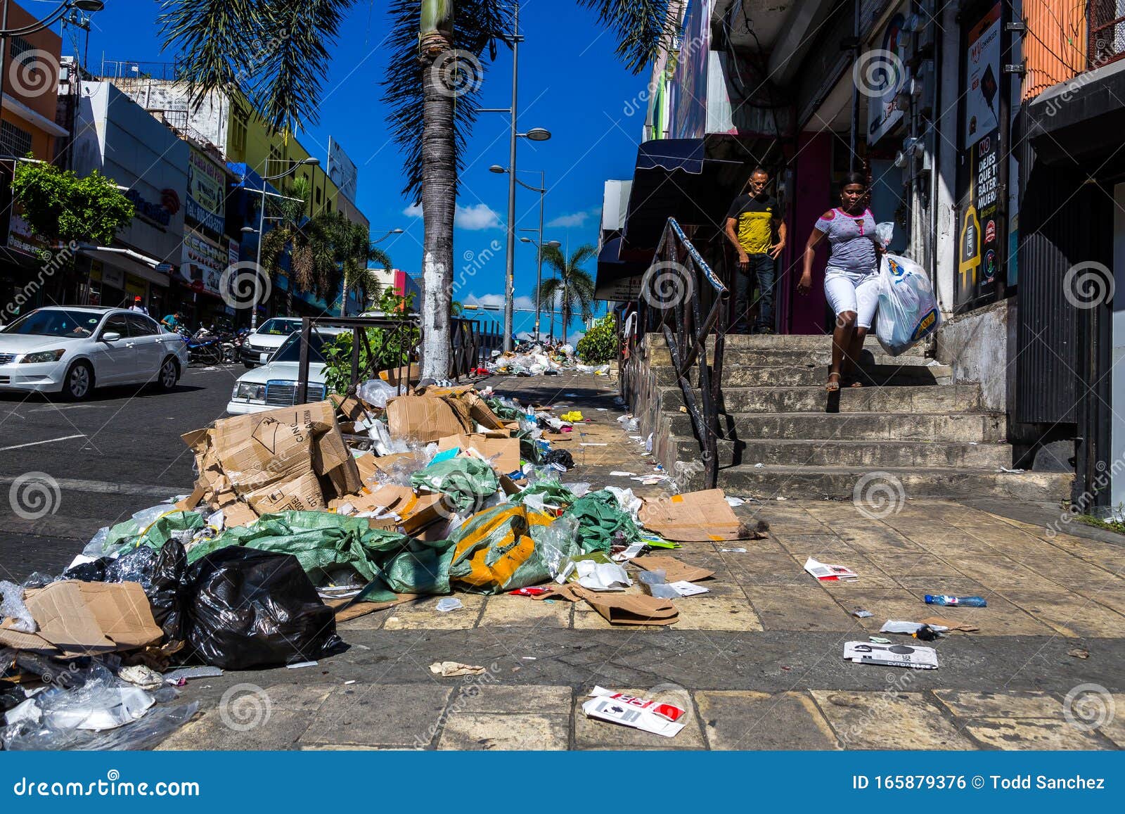 Dramatic Angle Image of Garbage Trash and Plastic on the Sidewalk of ...