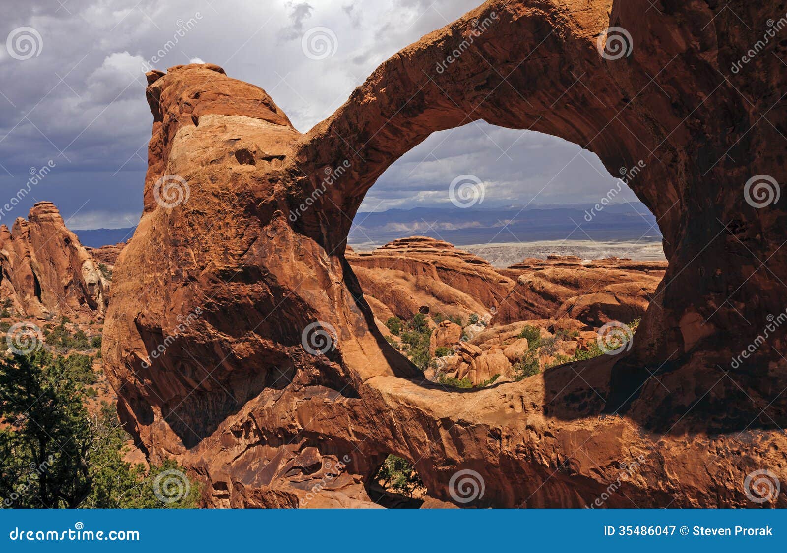Dramatic Arch on Spring Day in the Desert Stock Image - Image of ...