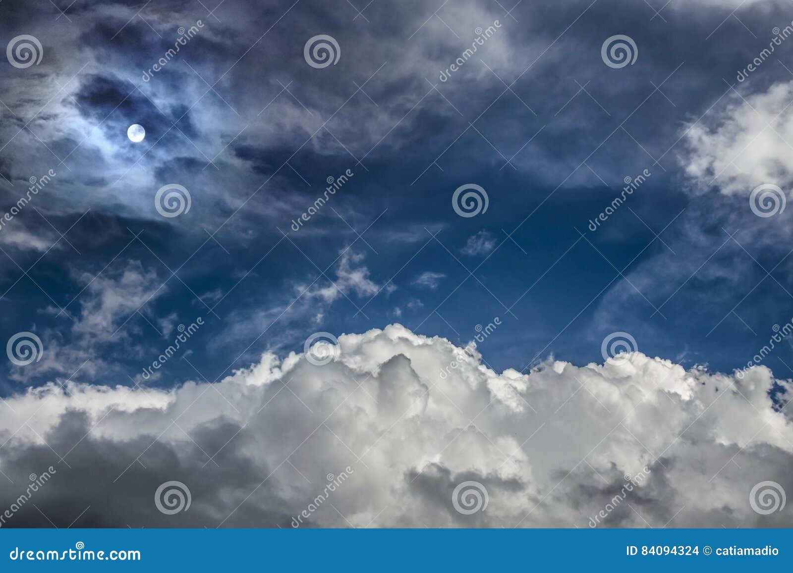Dramatic Blue Clouds and Moon Stock Photo - Image of strong, grey: 84094324