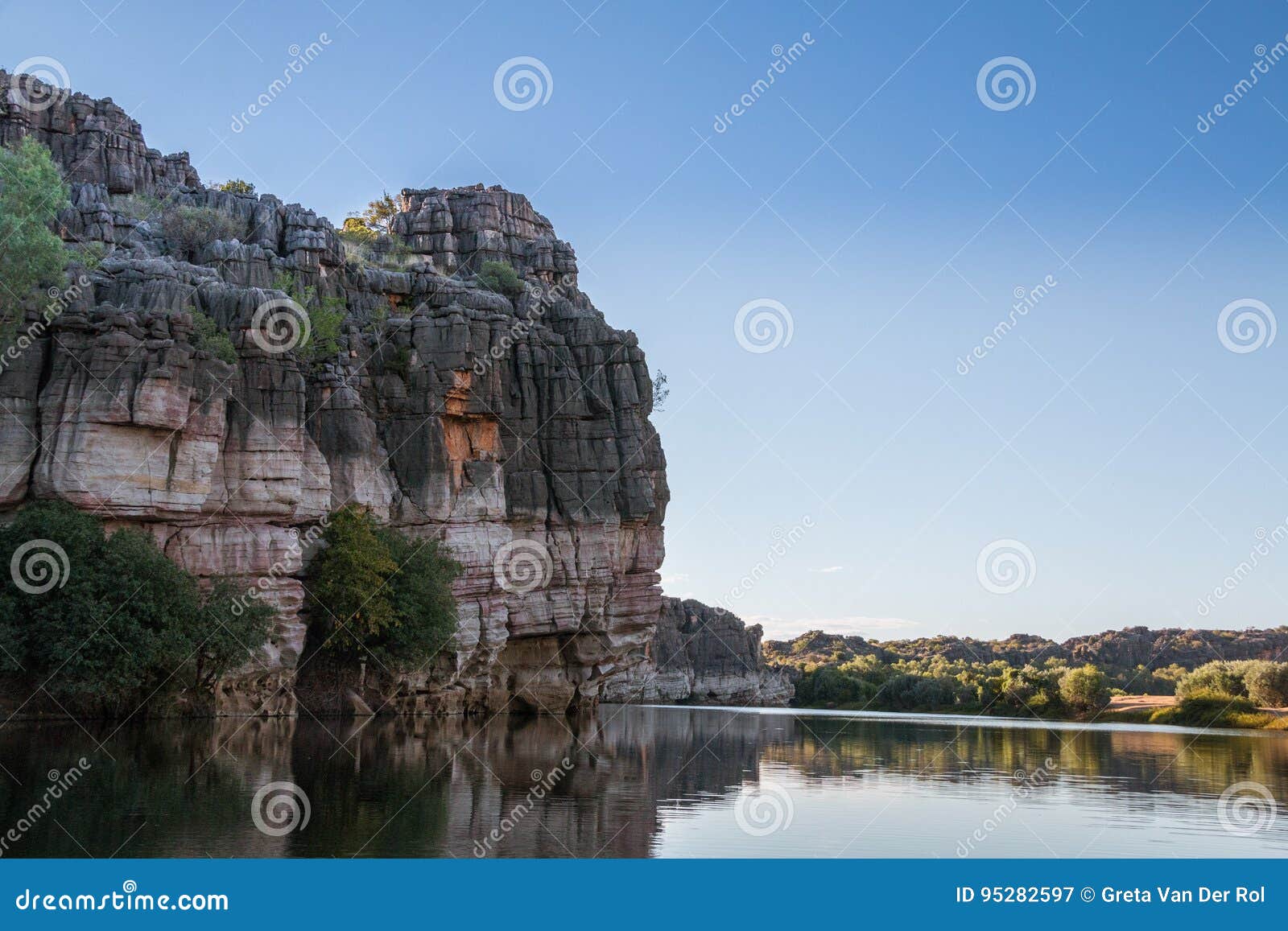 Dramatic Cliffs Against a Bright Sky Stock Image - Image of rocks ...