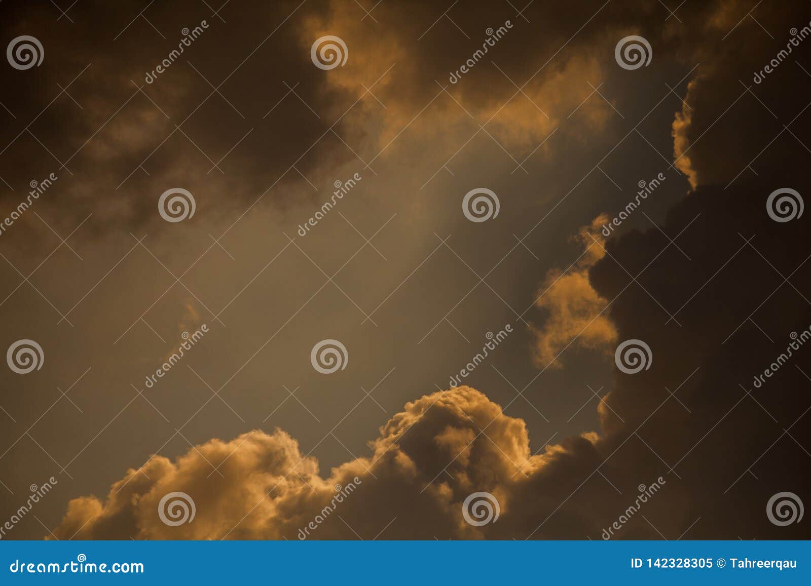 Dramatic clouds on sky stock image. Image of sunset - 142328305
