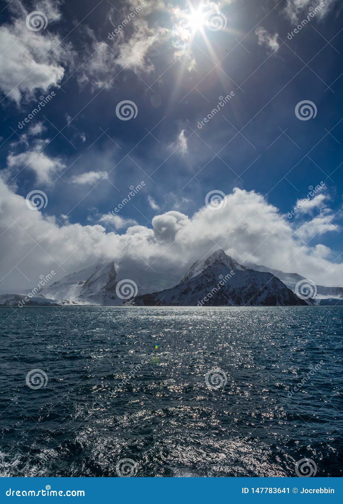 Dramatic Clouds Surround the Sharp Peaks of Antarctic Mountains Stock ...
