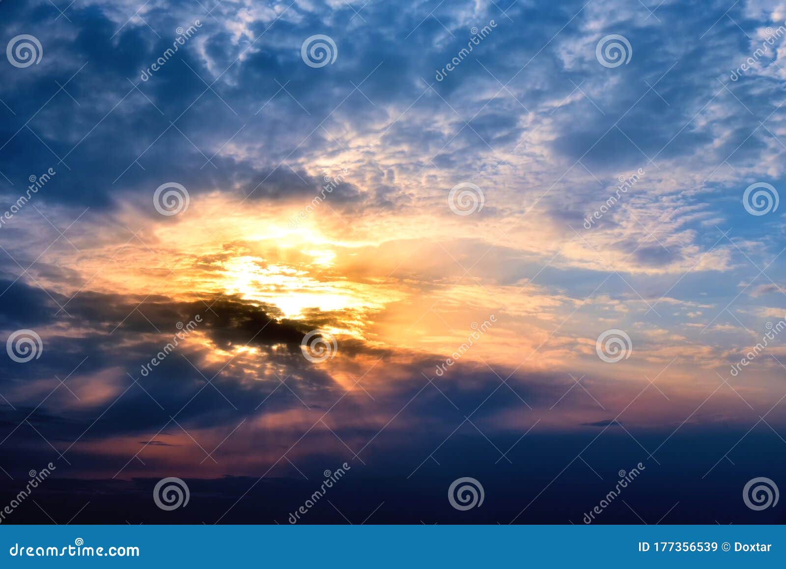 Dramatic Clouds at Sunset. Beautiful Rays of the Sun Stock Image ...