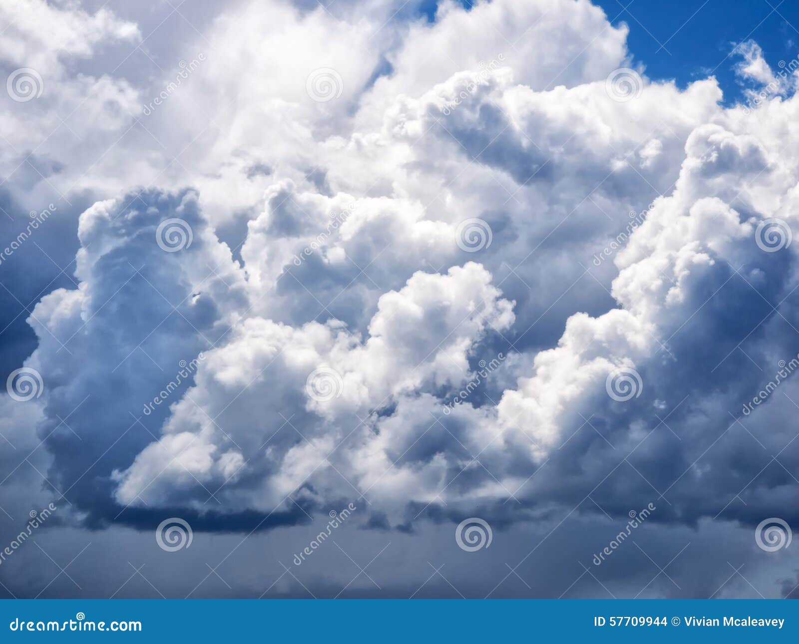 Dramatic cumulus clouds stock photo. Image of atmosphere - 57709944