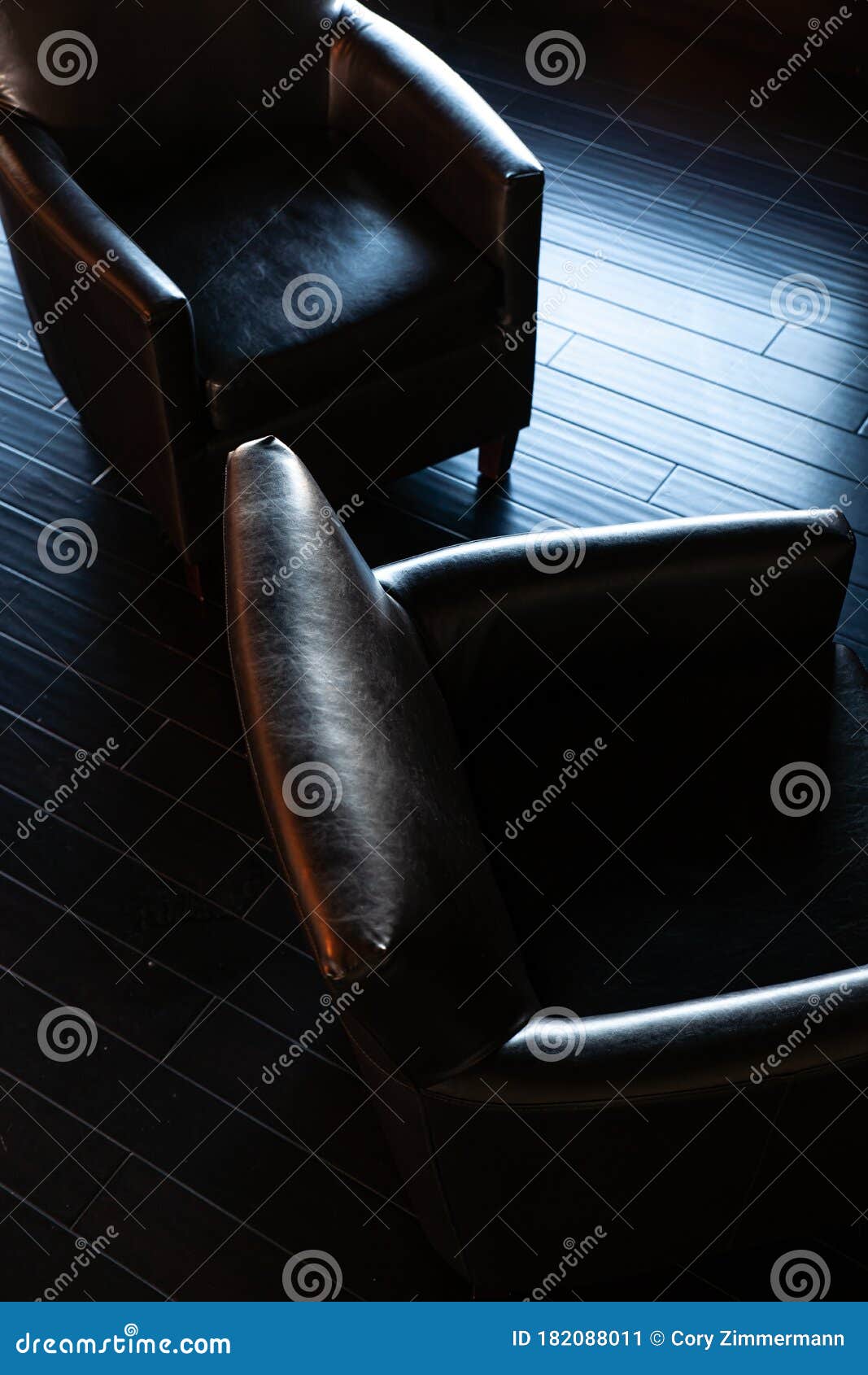 Dramatic Dark Lighting on Comfortable Office Chair Stock Image - Image ...
