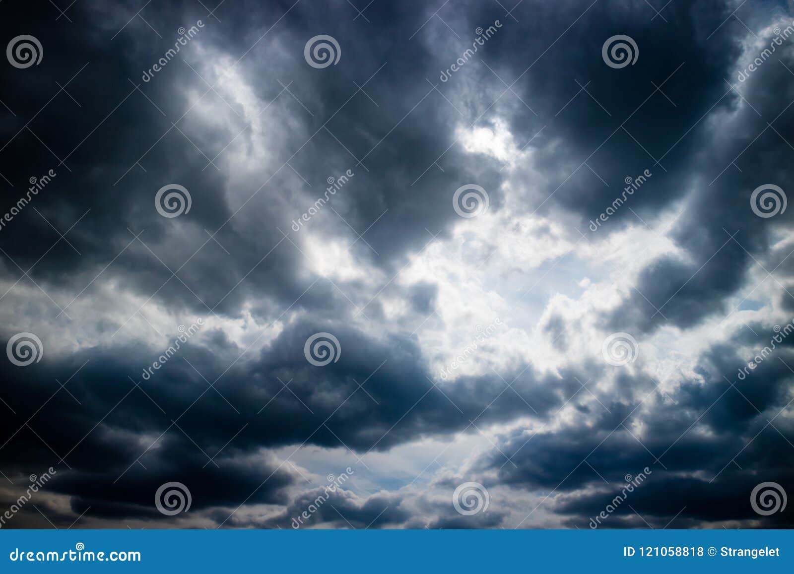 Dramatic Rain Clouds with a Blue Sky Gap. Stock Photo - Image of cloud ...