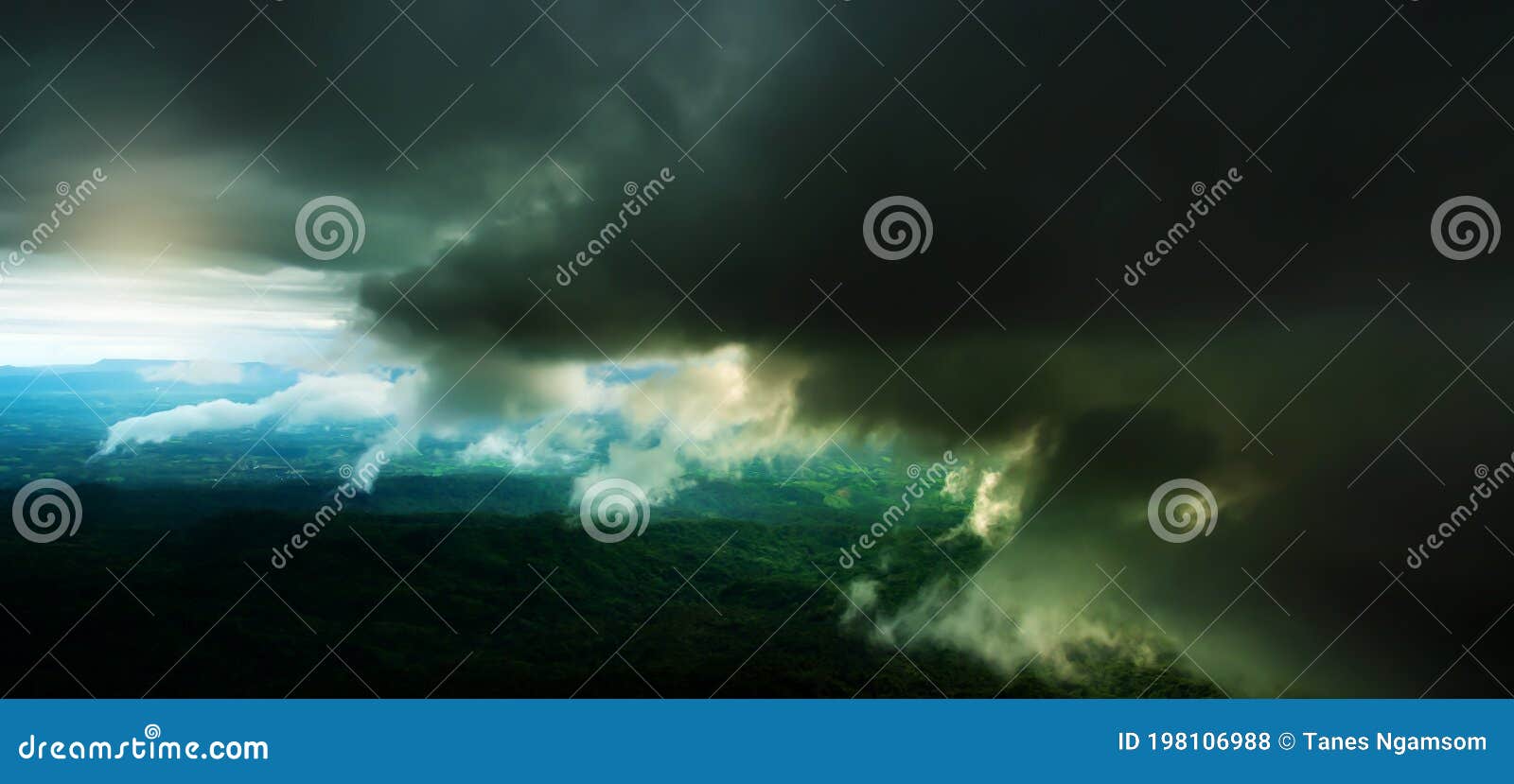 Dramatic Dark Storm Clouds Over a Green Forest Stock Photo - Image of ...