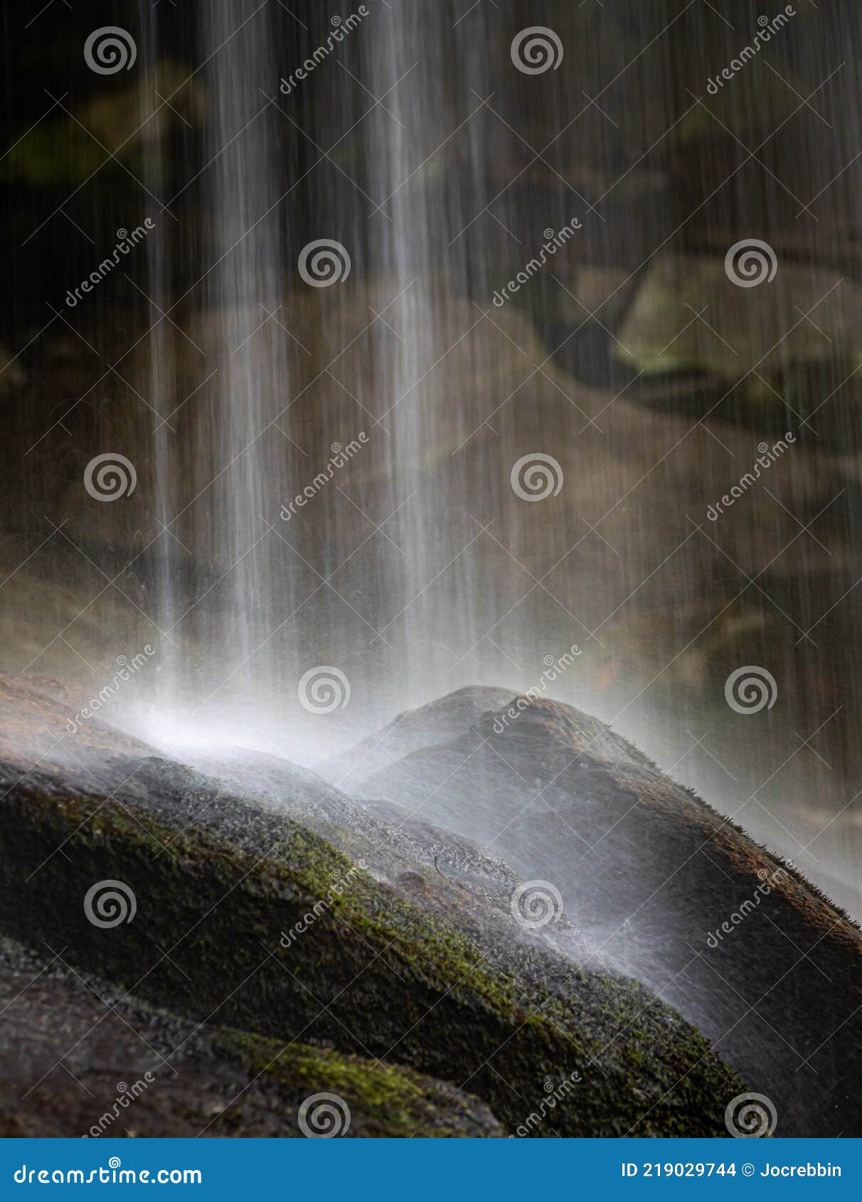 Dramatic Display of Water Hitting Rocks in Forest Stock Photo - Image ...