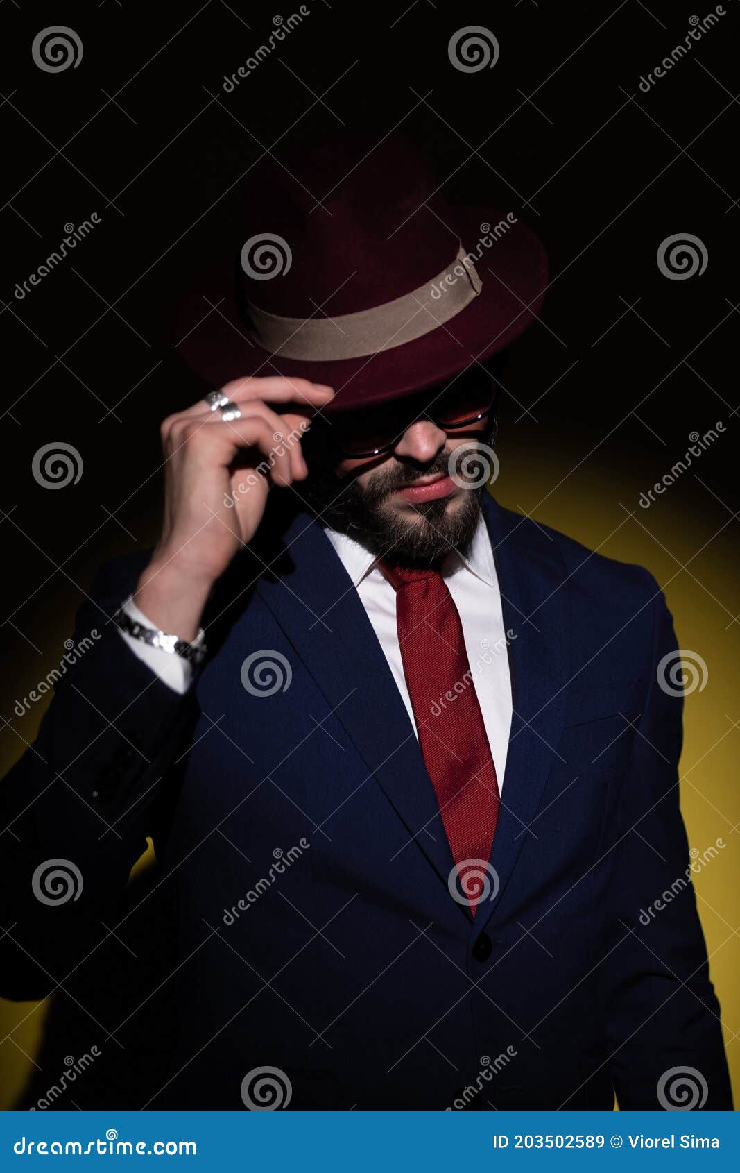 Dramatic Elegant Man in Suit Pulling Hat Over Face and Hiding Stock ...
