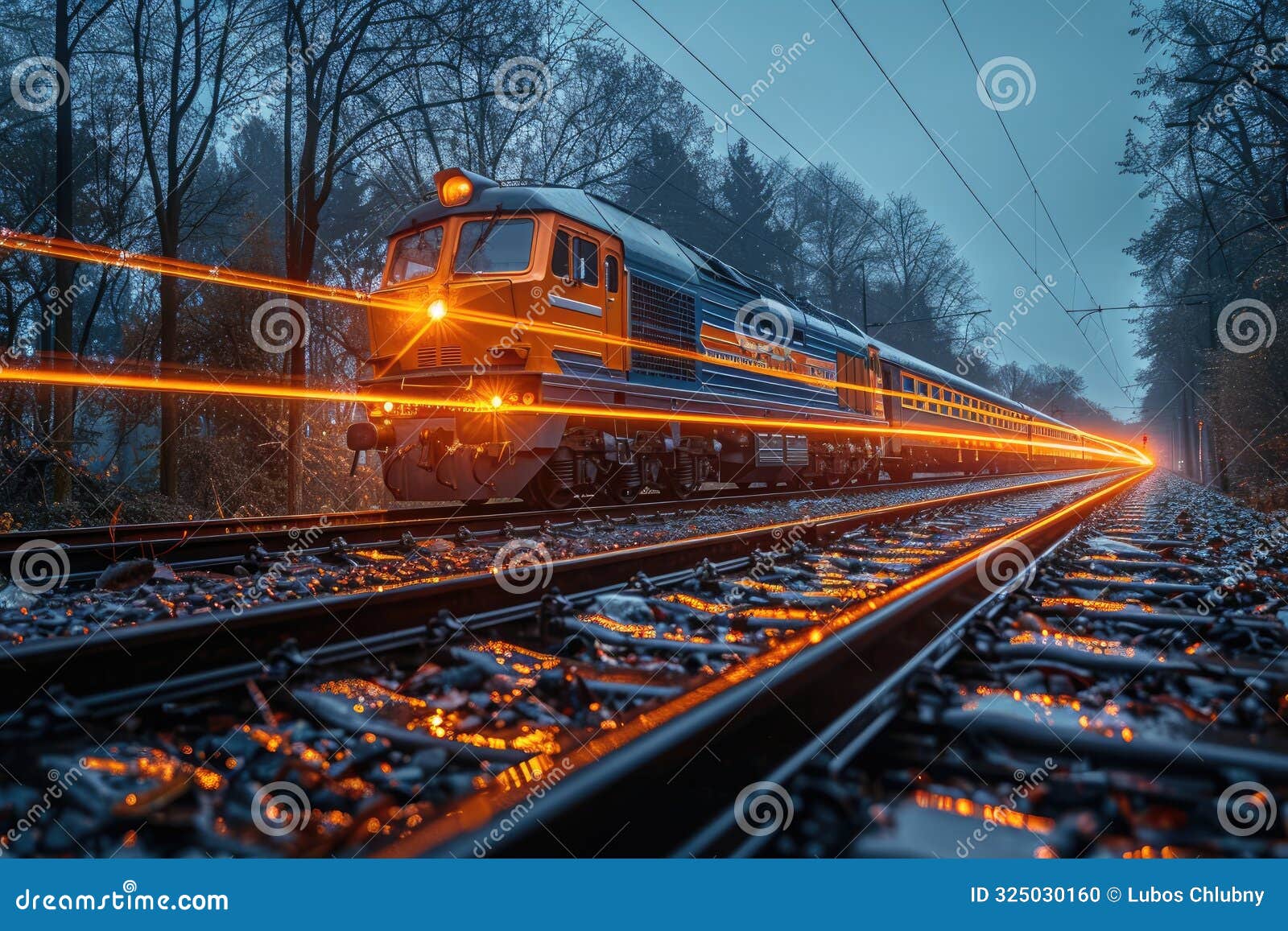 A Dramatic Evening Shot Capturing a Moving Train with Dynamic Light ...