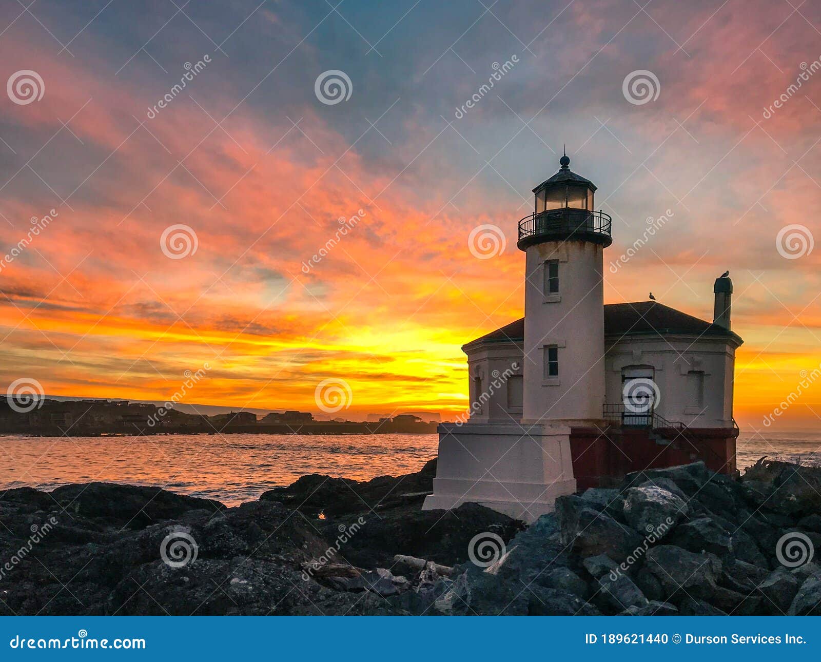 Dramatic Evening Sky with Clouds Over Oregon Lighthouse, Warm Sunset ...