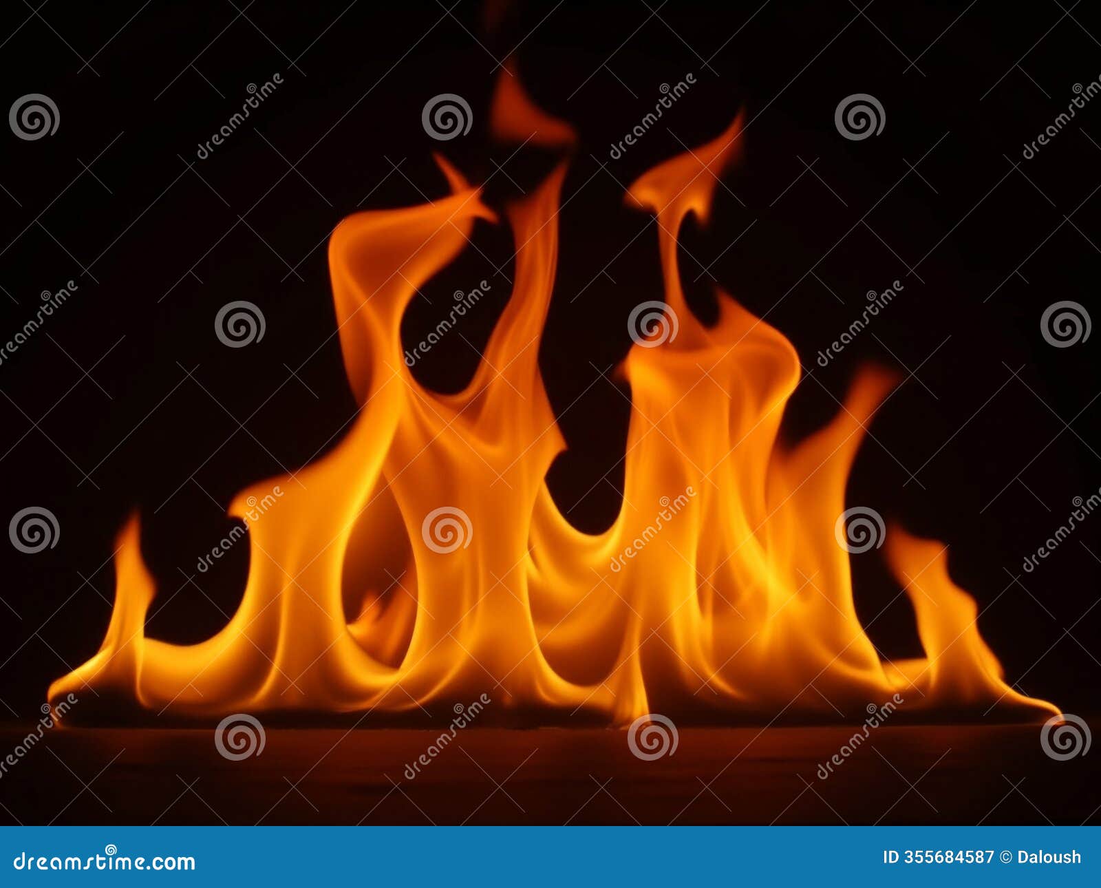 Dramatic Flames on a Dark Background - Exploring the Vivid Movement and ...