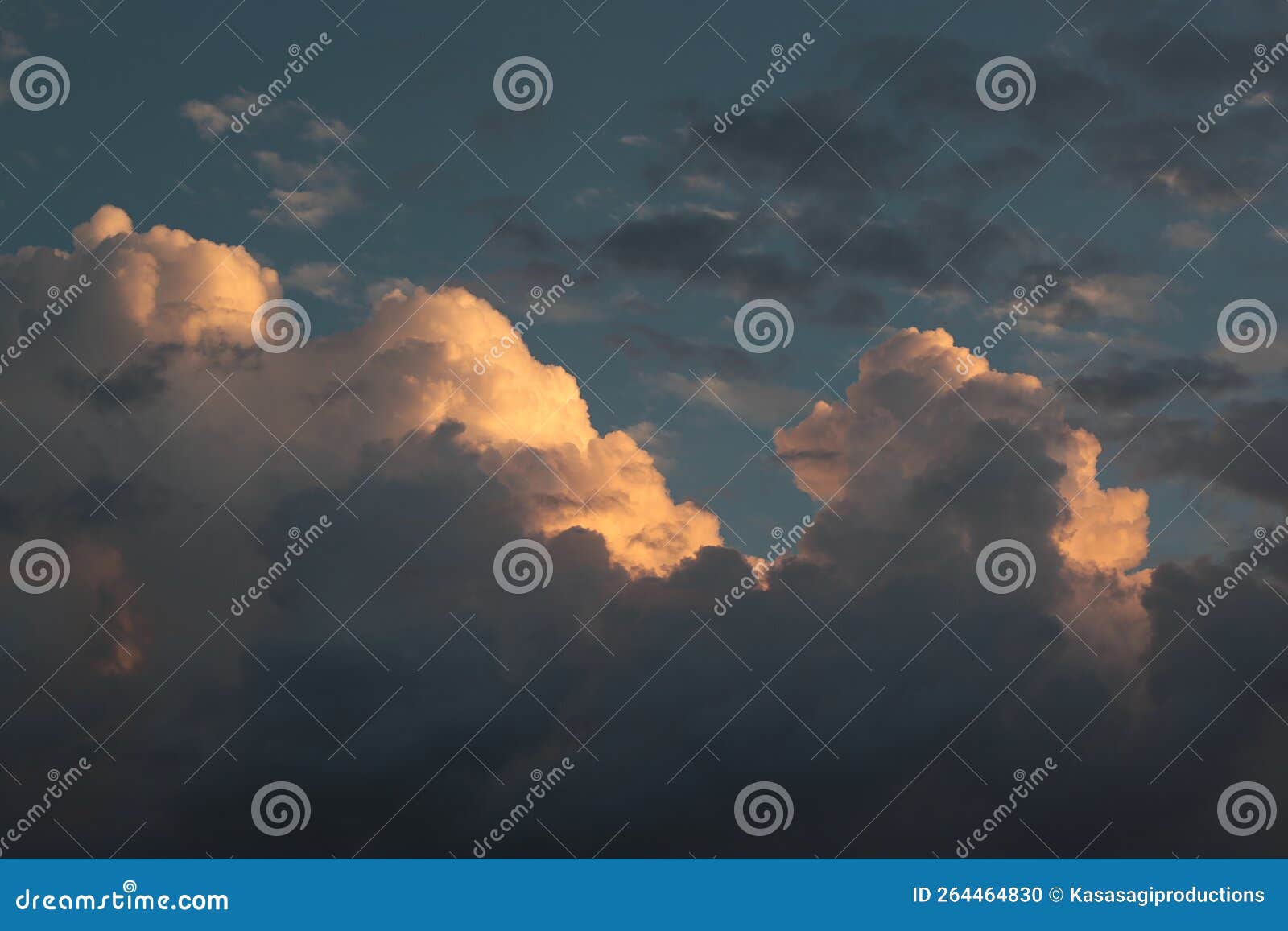 Dramatic Fluffy Backlit Clouds on a Dark Sky Stock Photo - Image of ...