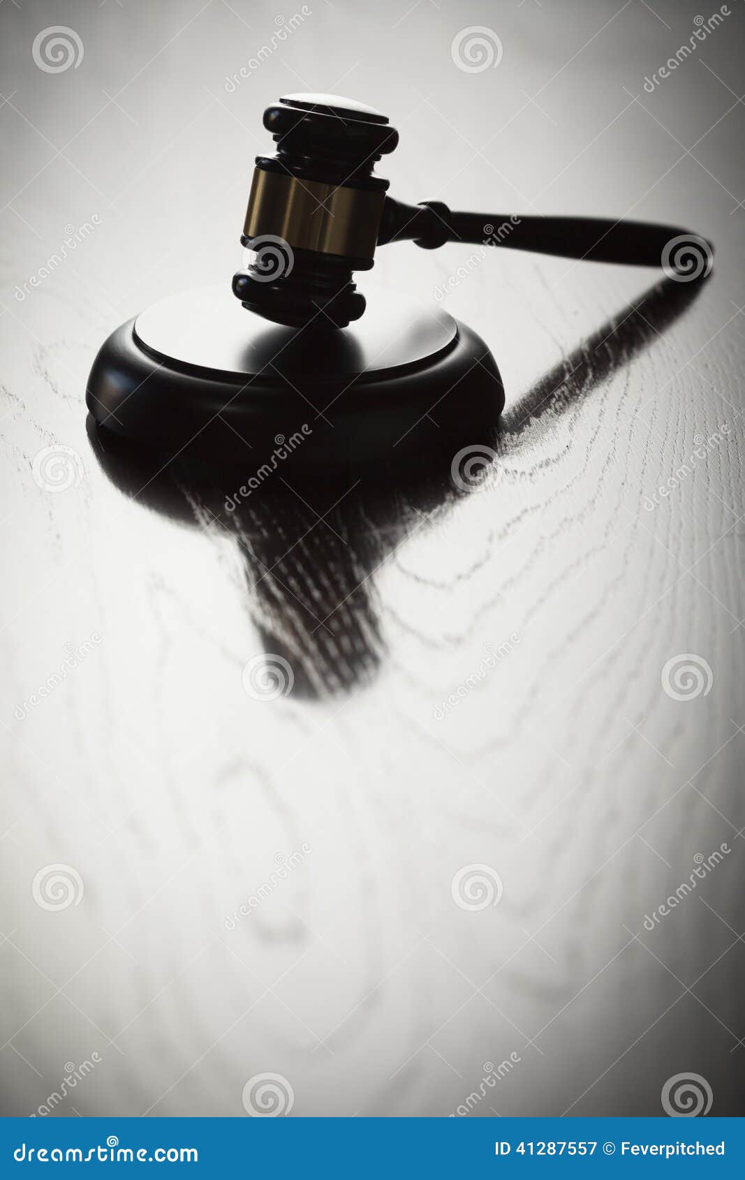 Dramatic Gavel Silhouette on Reflective Wood Stock Image - Image of ...