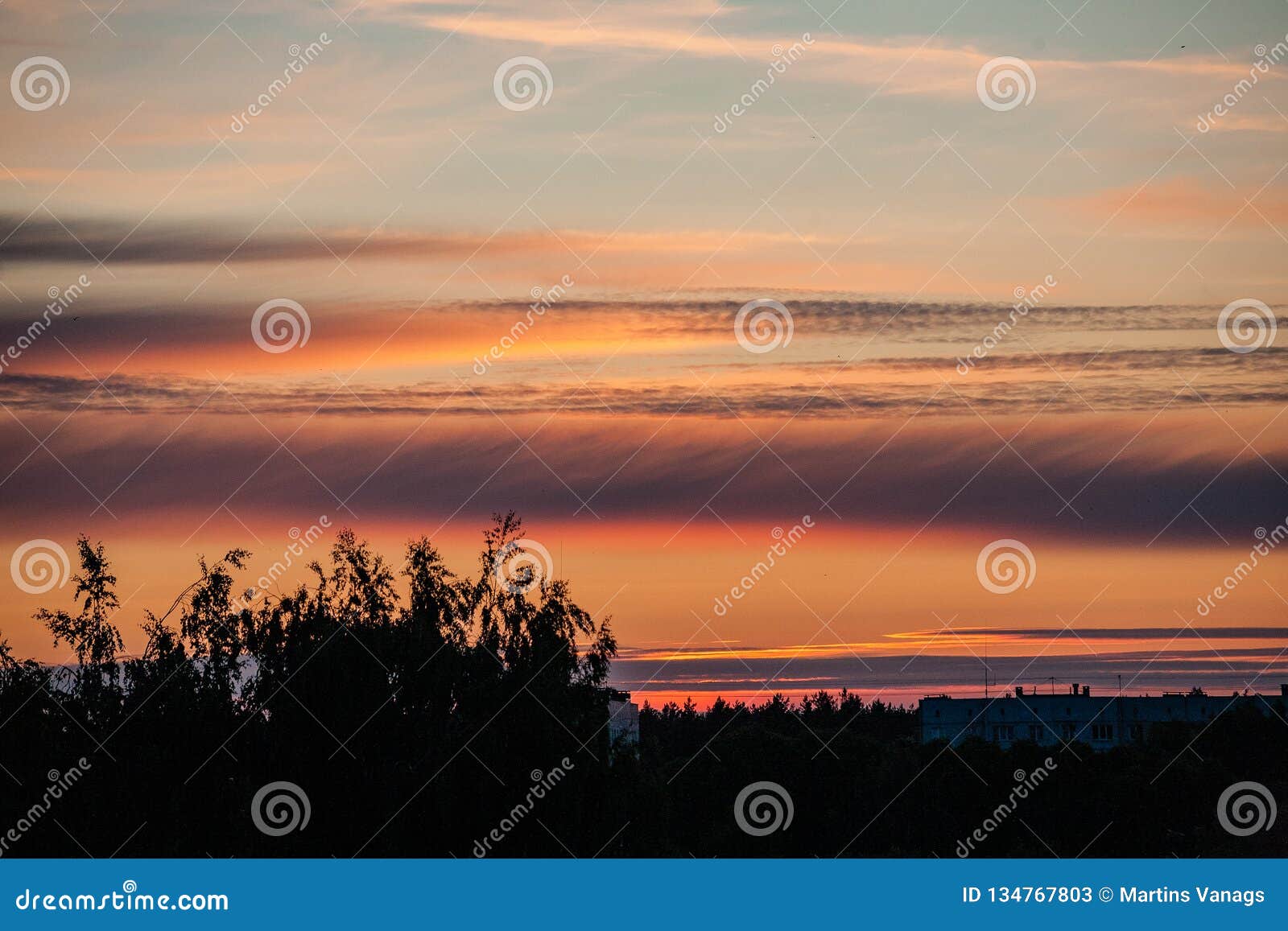 Dramatic High Contrast Clouds in Sunset Over Seaside Beach Stock Image ...
