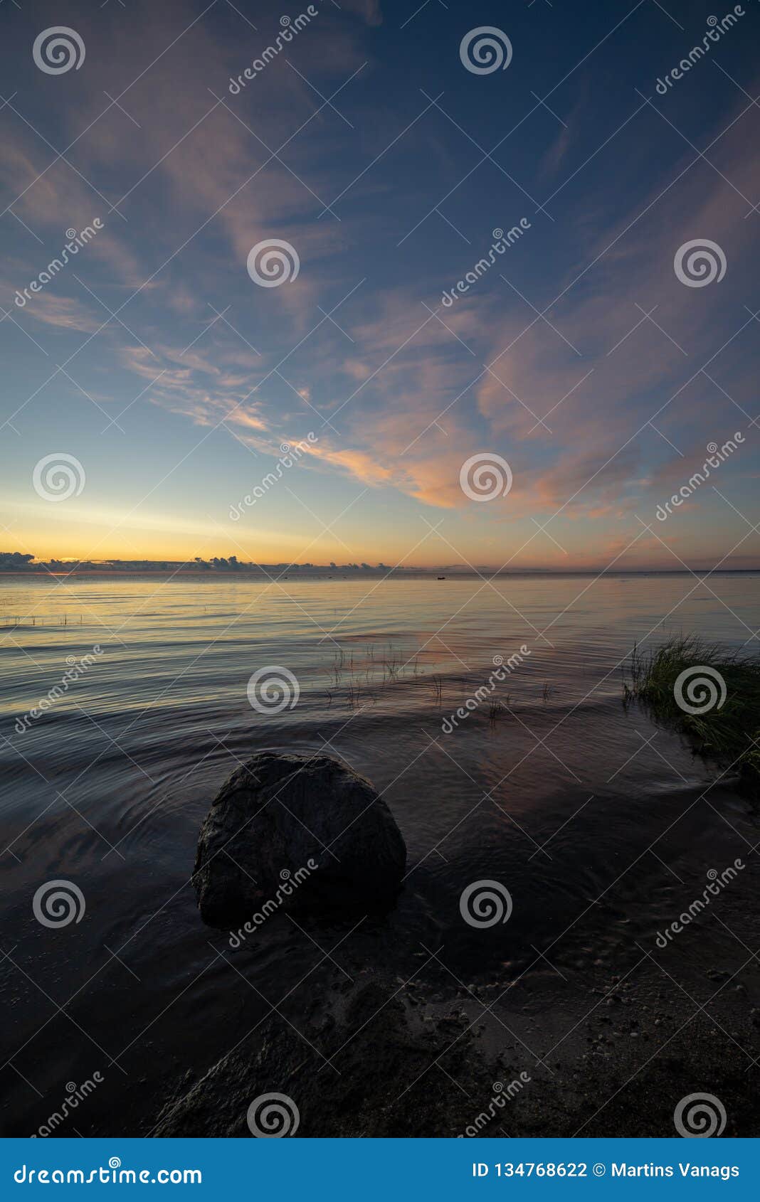 Dramatic High Contrast Clouds in Sunset Over Seaside Beach Stock Photo ...