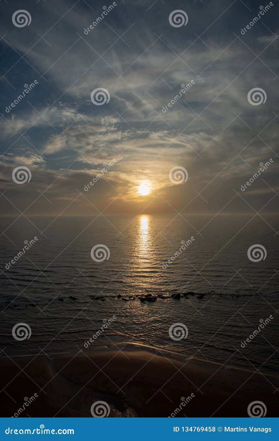 Dramatic High Contrast Clouds in Sunset Over Seaside Beach Stock Photo ...