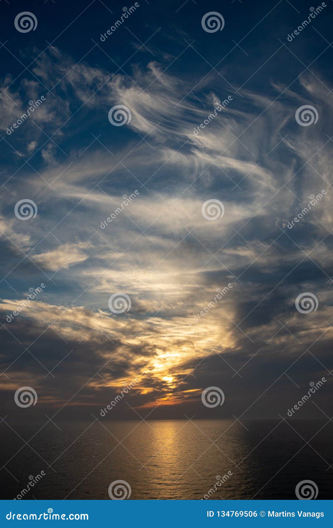 Dramatic High Contrast Clouds in Sunset Over Seaside Beach Stock Photo ...