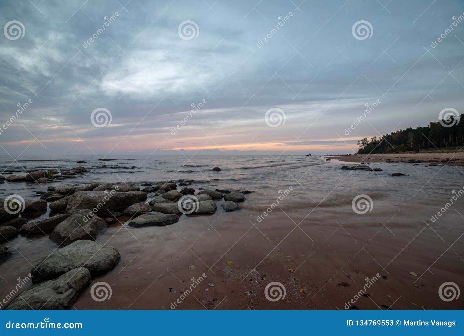 Dramatic High Contrast Clouds in Sunset Over Seaside Beach Stock Image ...