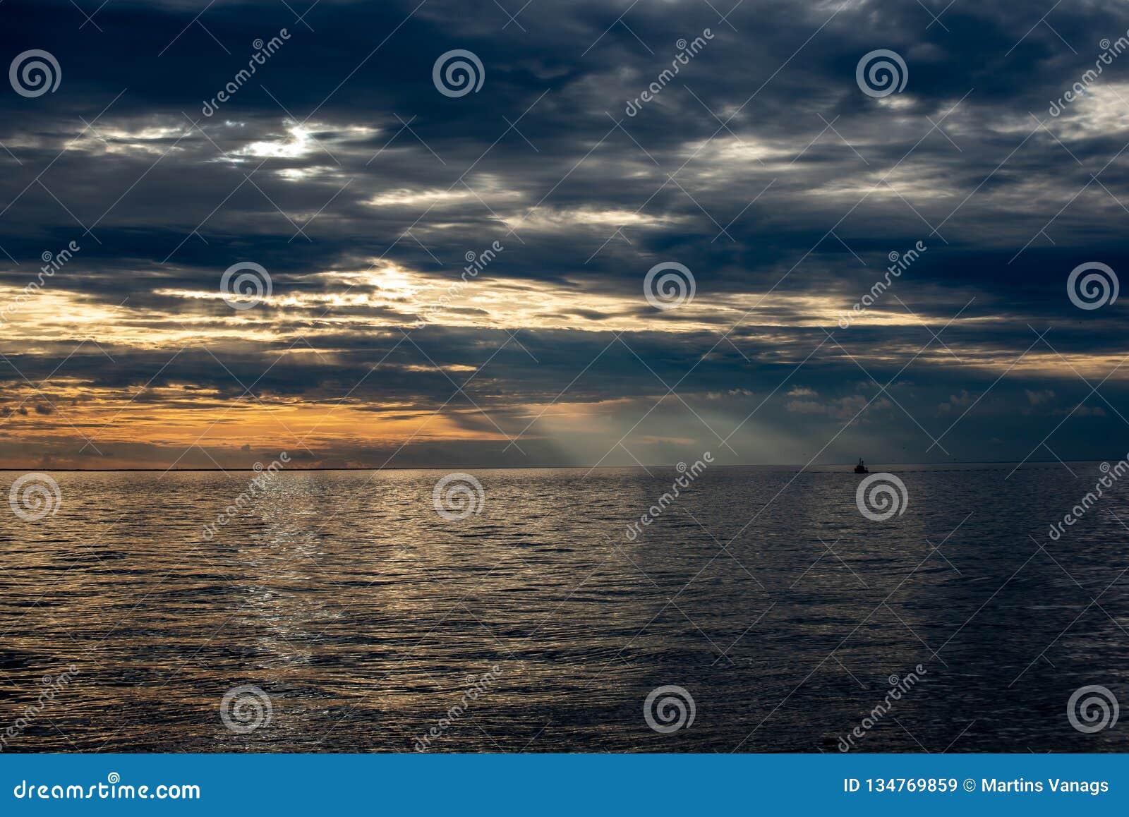 Dramatic High Contrast Clouds in Sunset Over Seaside Beach Stock Image ...