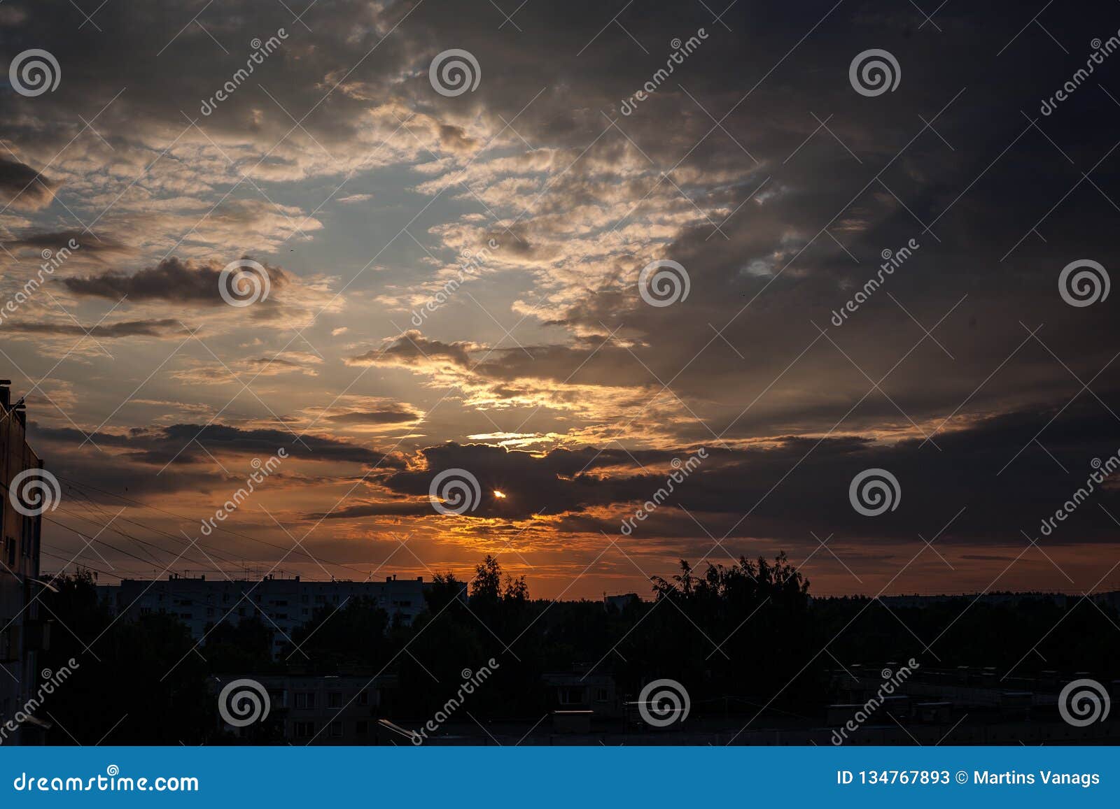 Dramatic High Contrast Clouds in Sunset Over Seaside Beach Stock Image ...