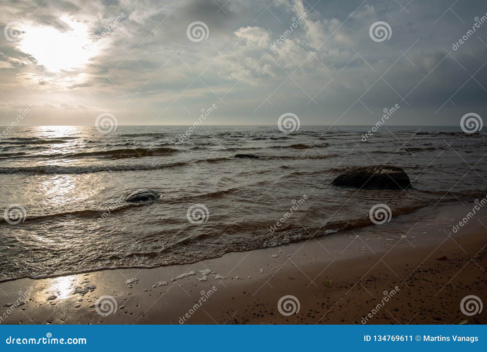 Dramatic High Contrast Clouds in Sunset Over Seaside Beach Stock Image ...