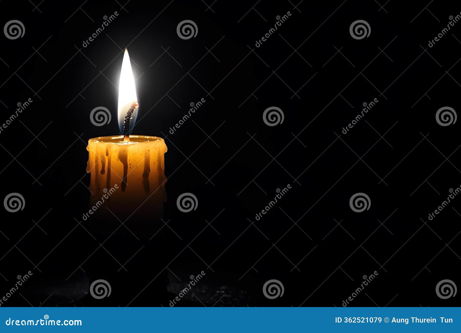 A Dramatic, High-contrast Image of a Solitary Candle Flickering in the ...