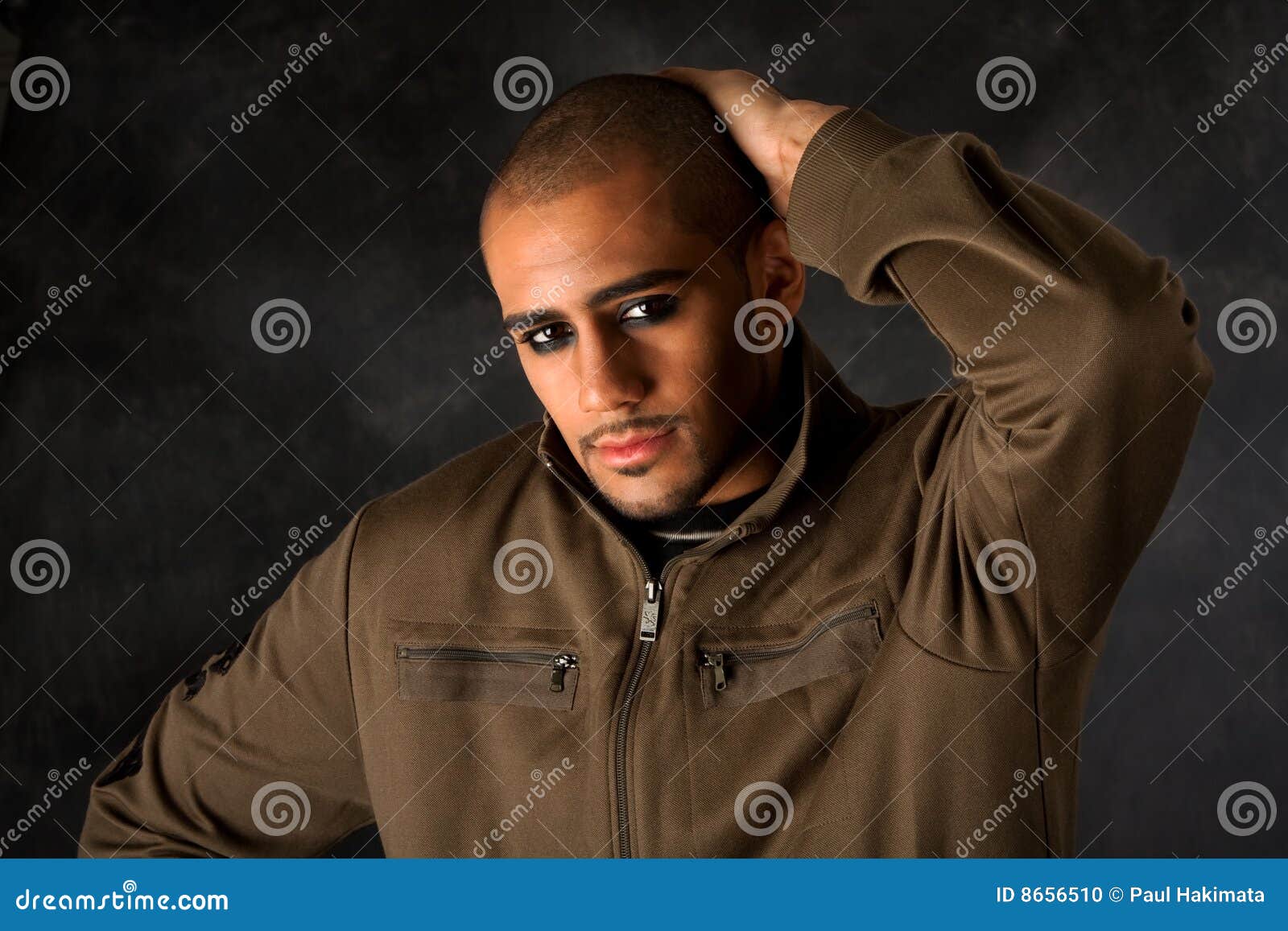 Dramatic Hispanic guy stock photo. Image of face, dark - 8656510