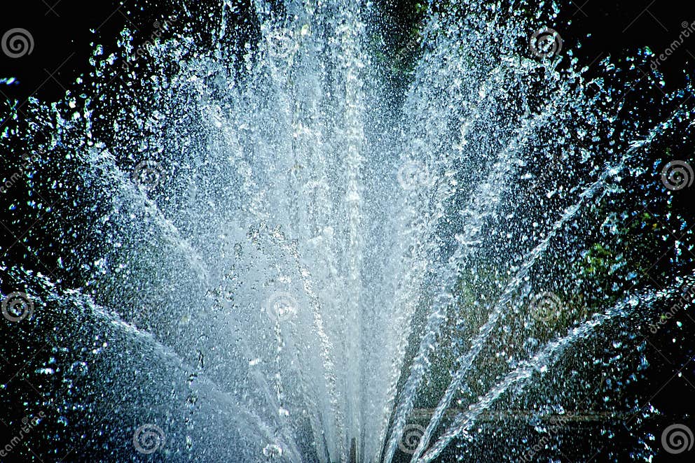Dramatic Image of Fan Shaped Water Fountain Stock Image - Image of ...