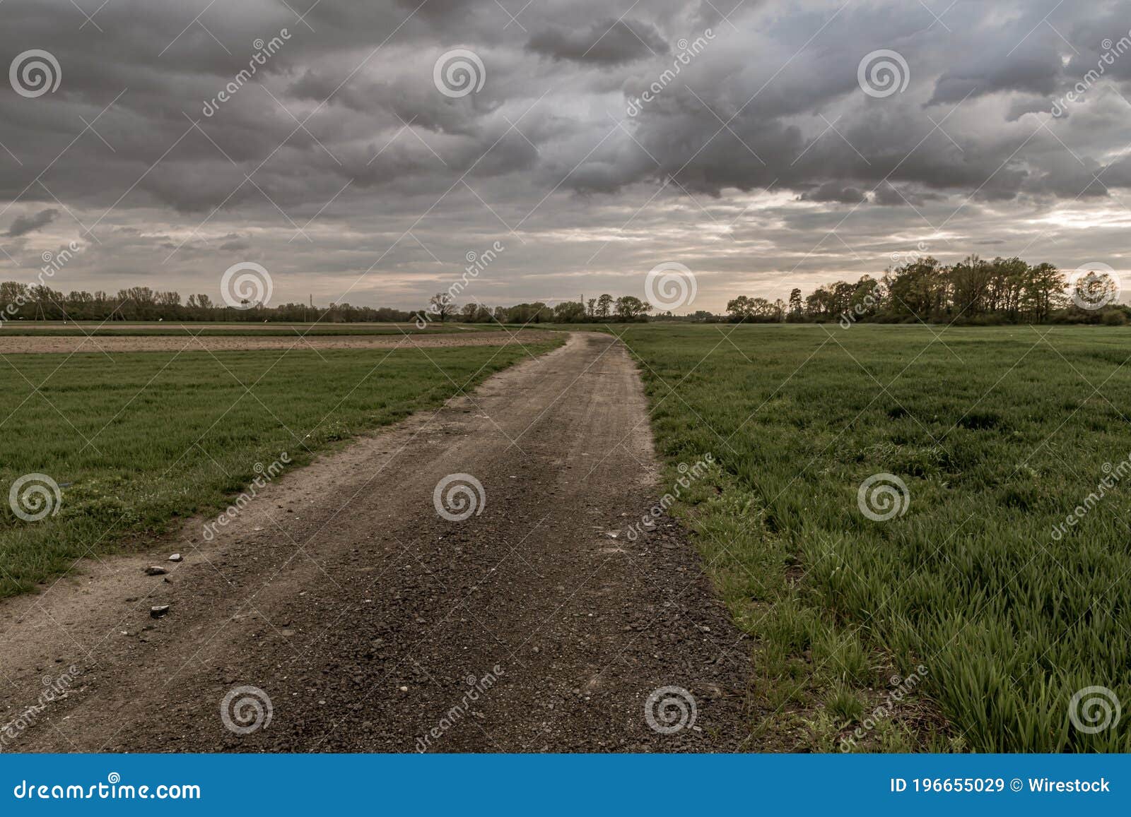 Dramatic Landscape View of with a Rural Road Disappearing in the ...