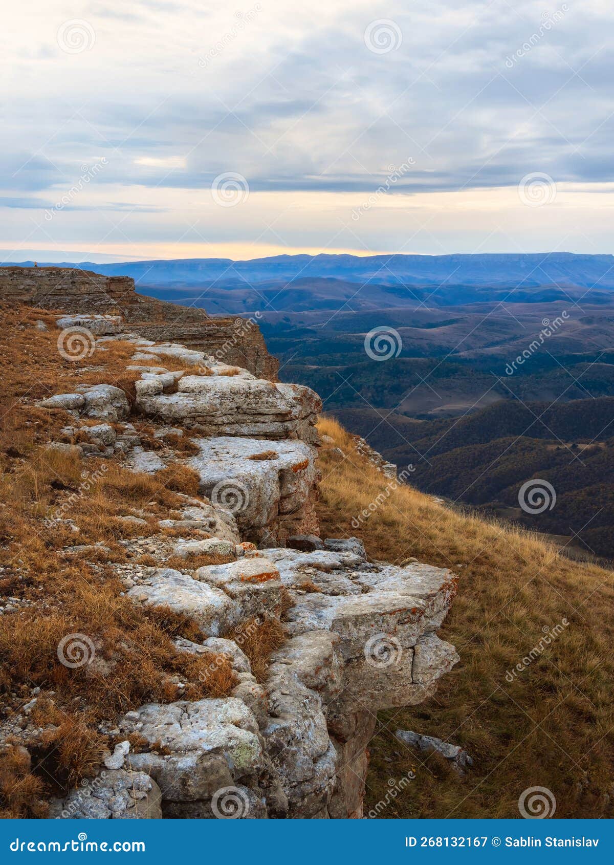 Dramatic Landscape with Wide Sharp Mountain Ridge Under Clouds in Blue ...