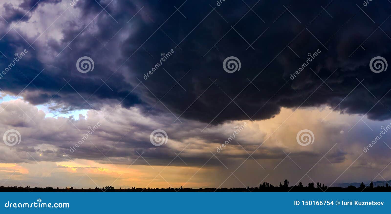 Dramatic Light through the Clouds Against the Backdrop of a Spectacular ...