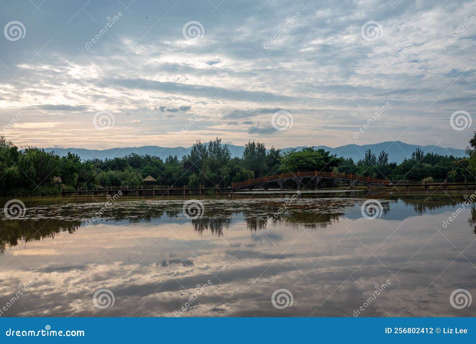Dramatic Panorama Sky and Clouds Over Mountain and Lake at Sunset Stock ...