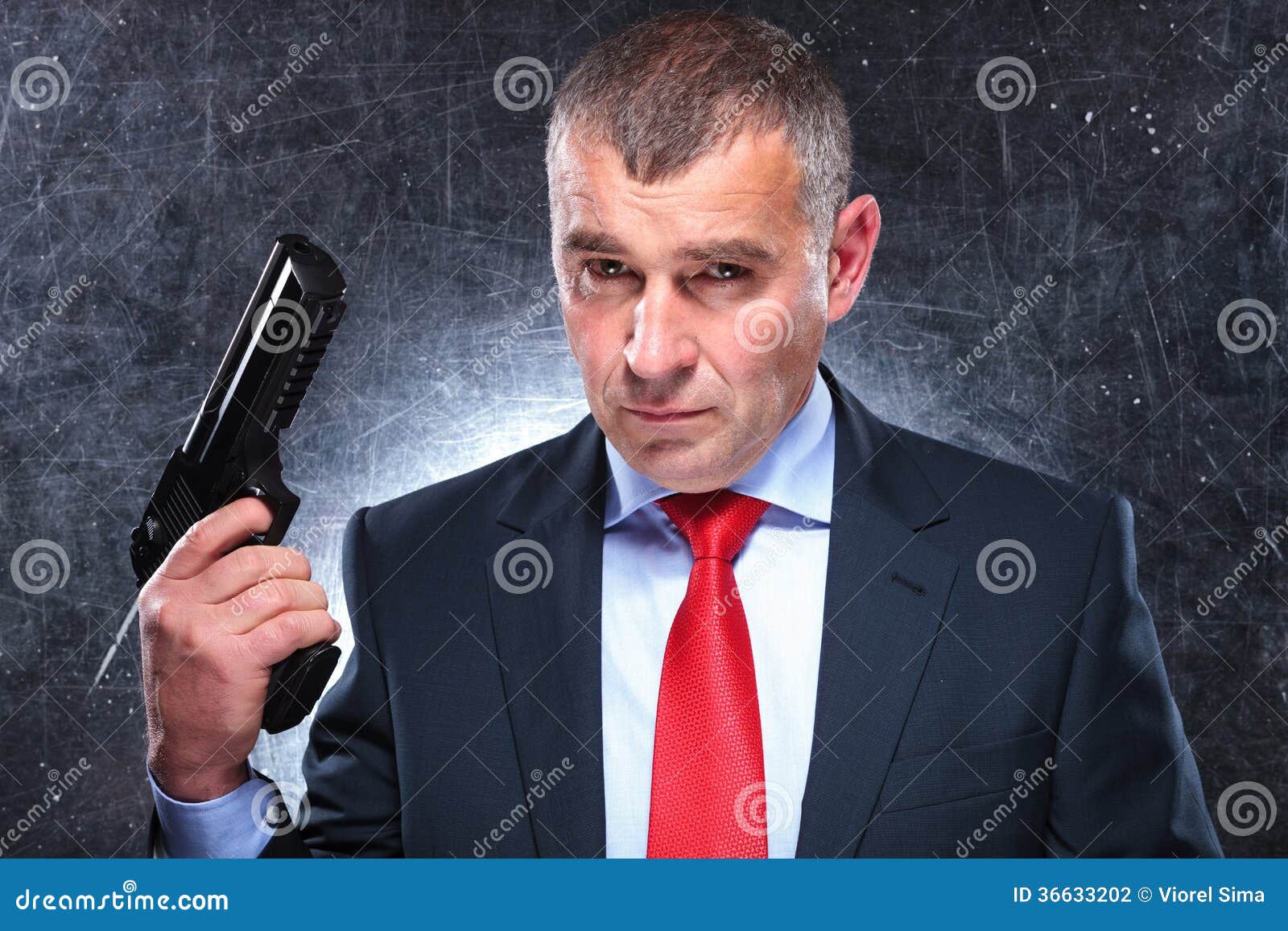 Dramatic Picture of an Old Assassin Holding His Gun Stock Photo - Image ...