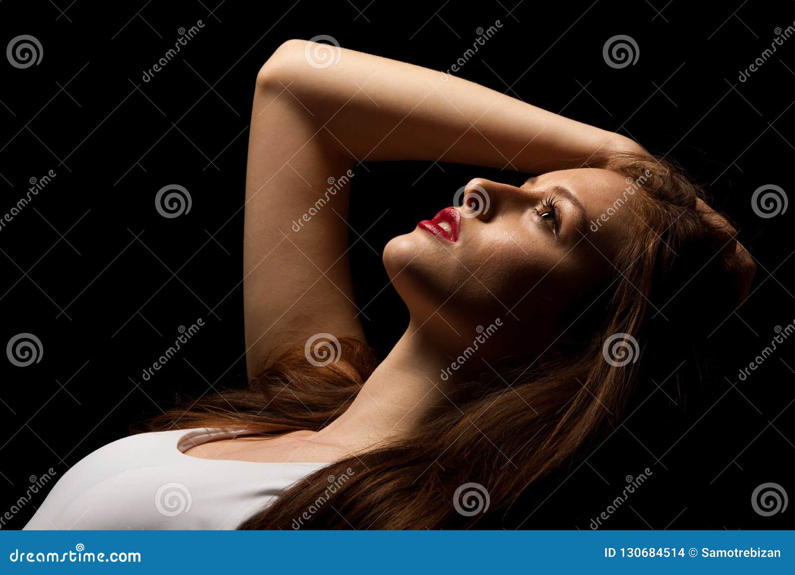 Dramatic Portrait of a Beautiful Young Woman Stock Photo - Image of ...