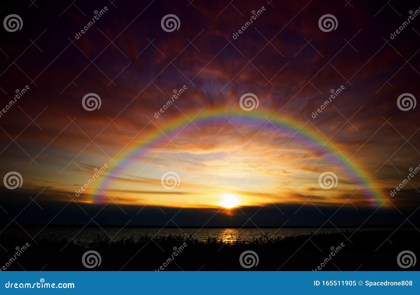 Dramatic Rainbow Captured during Sunset Landscape Background Stock ...