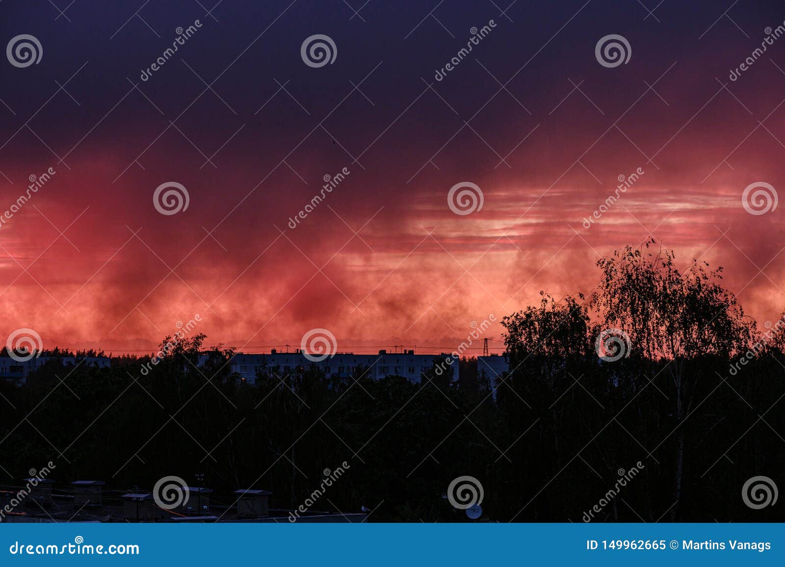 Dramatic Red Clouds Mist Over Trees on Sunset Stock Image - Image of ...