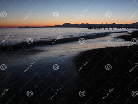 A Dramatic Scenery after Sun in a Seaside Stock Image - Image of sand ...