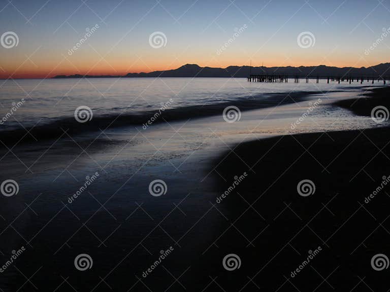 A Dramatic Scenery after Sun in a Seaside Stock Image - Image of sand ...