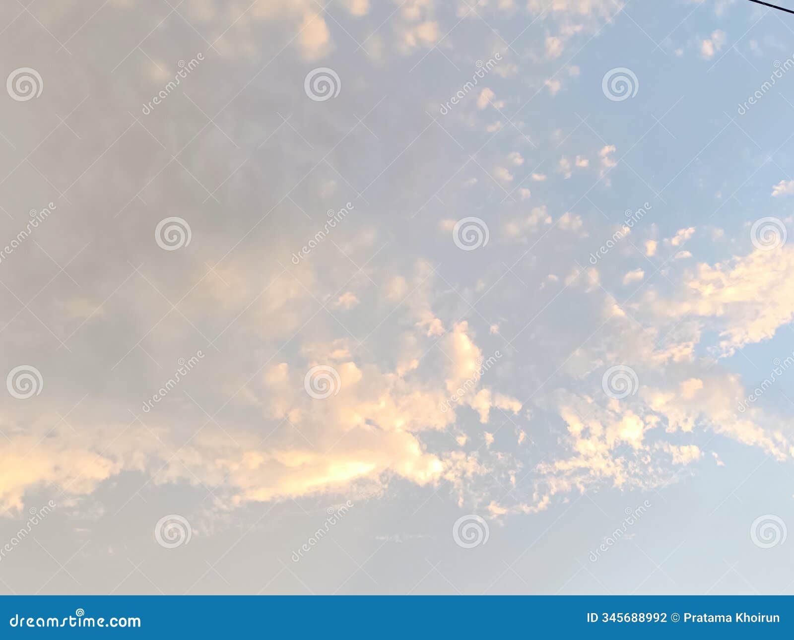 Dramatic Sky with Clouds, Sunlight, and a Soft, Hazy Atmosphere ...