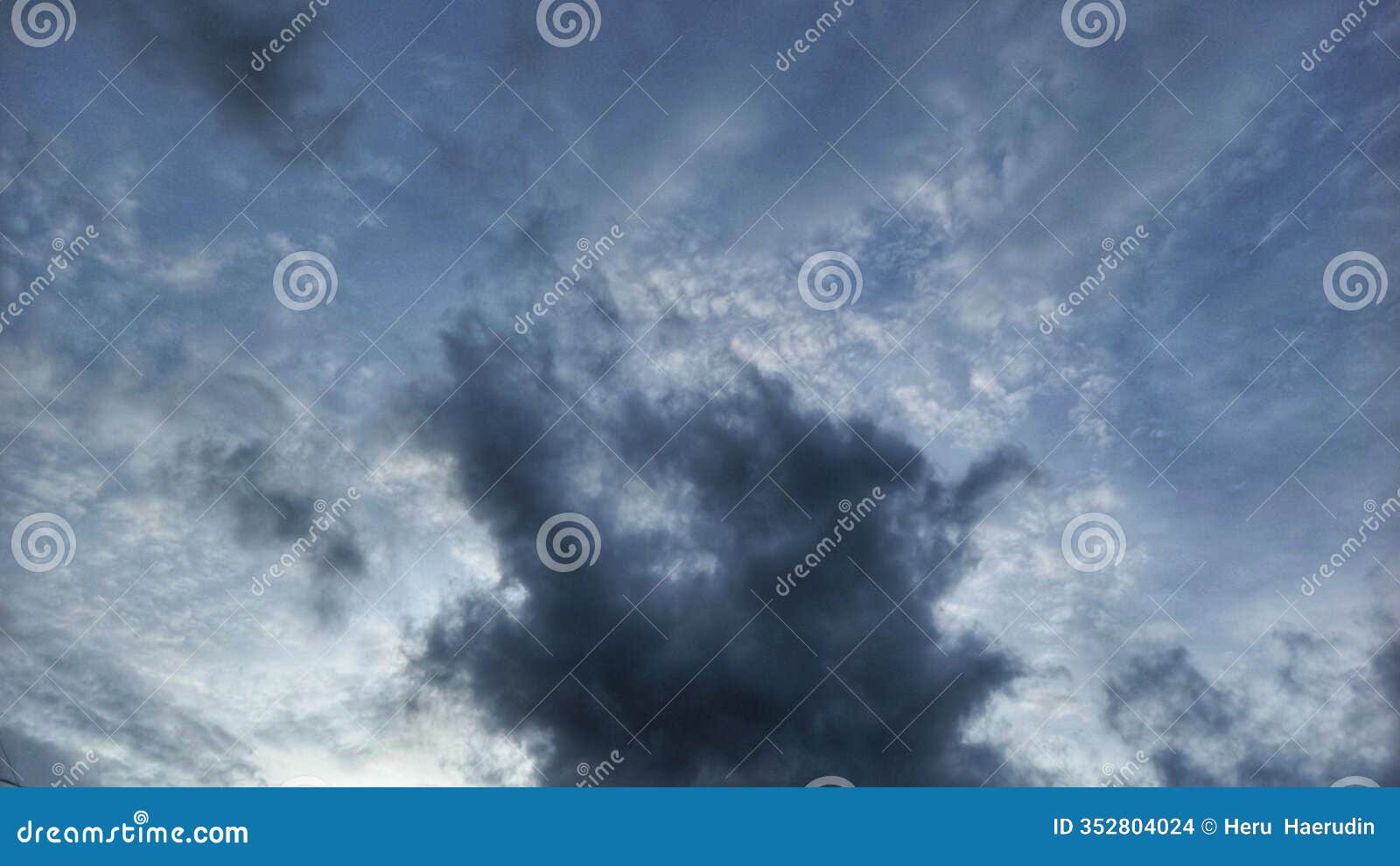 Dramatic Sky with Dark Clouds and Gentle Sunlight Peeking through Stock Photo - Image of horizon ...