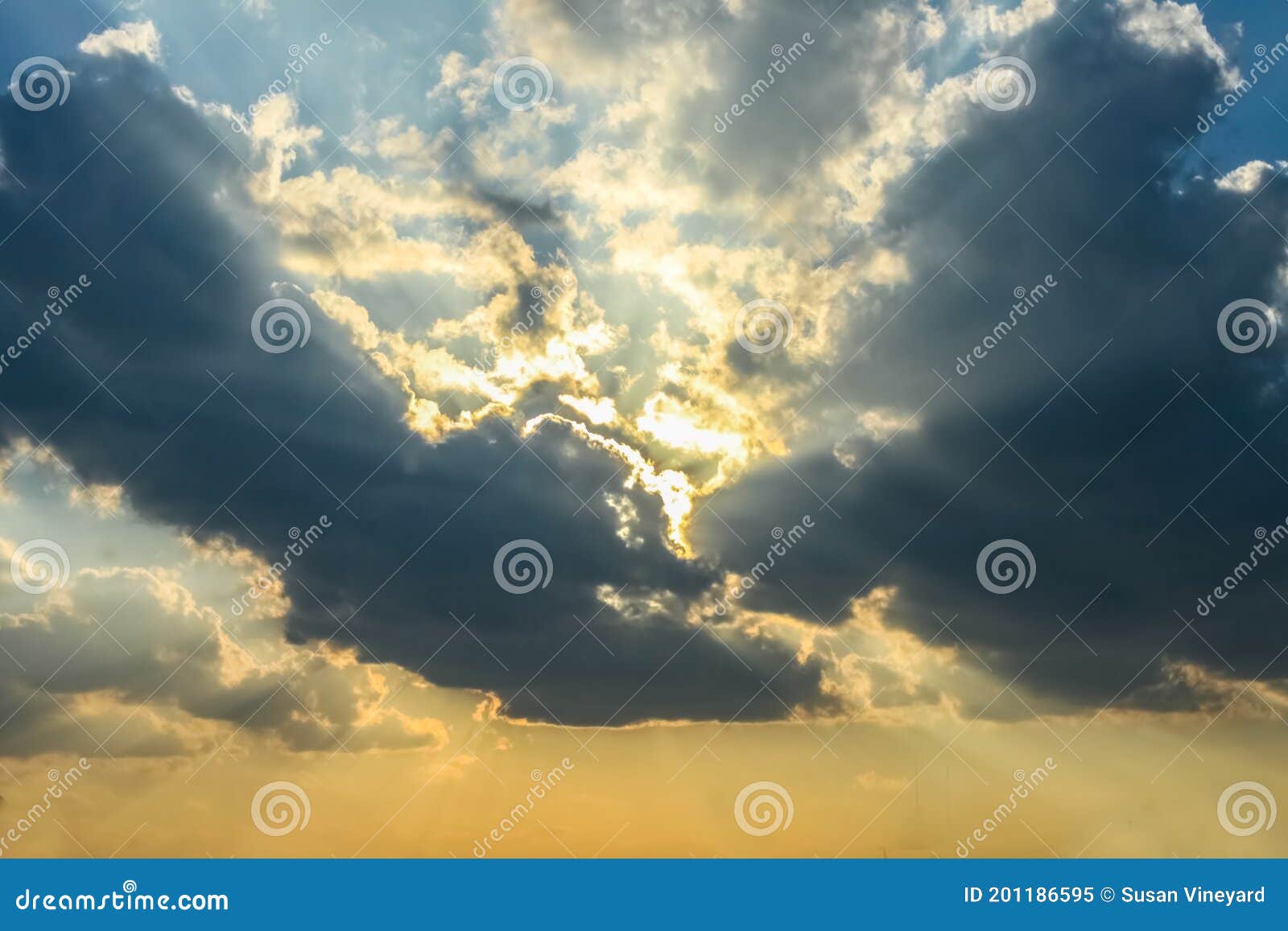 Dramatic Sky Near Sunset with Dark Brooding Clouds Above with Sunlight ...