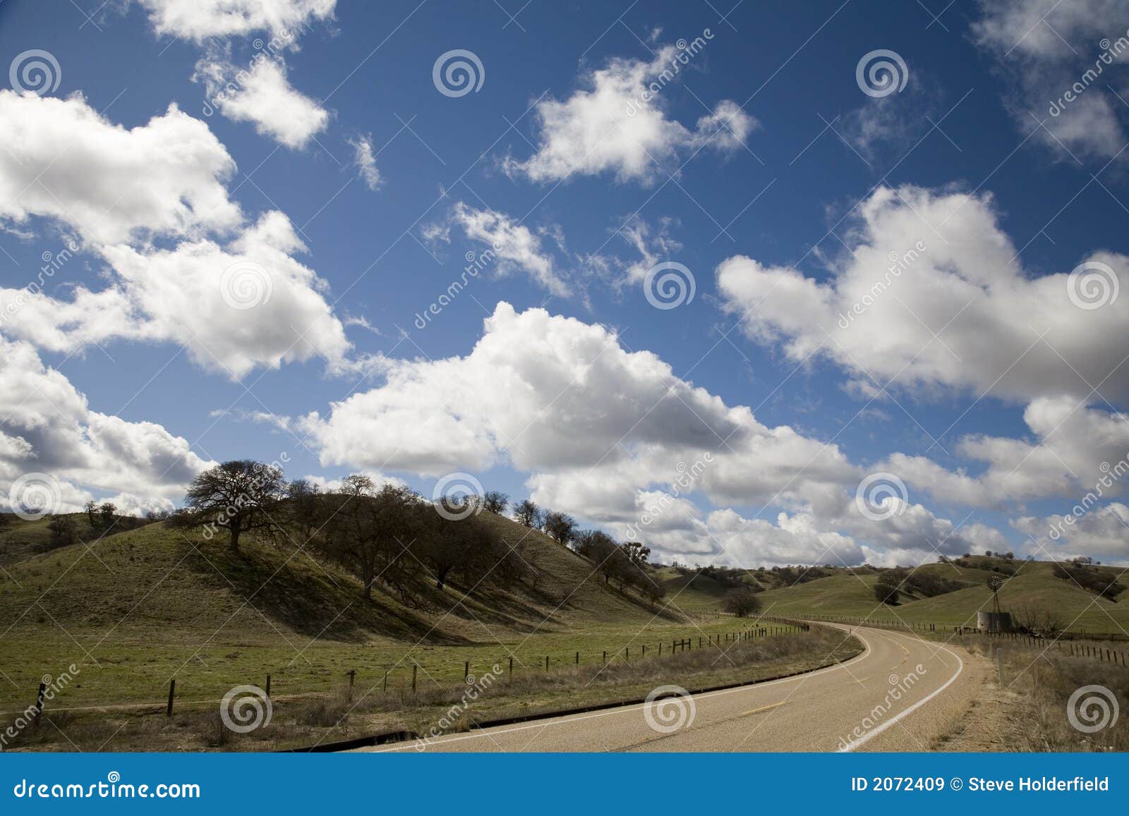 Dramatic Sky and a Turn in the Road Stock Image - Image of drive, line ...