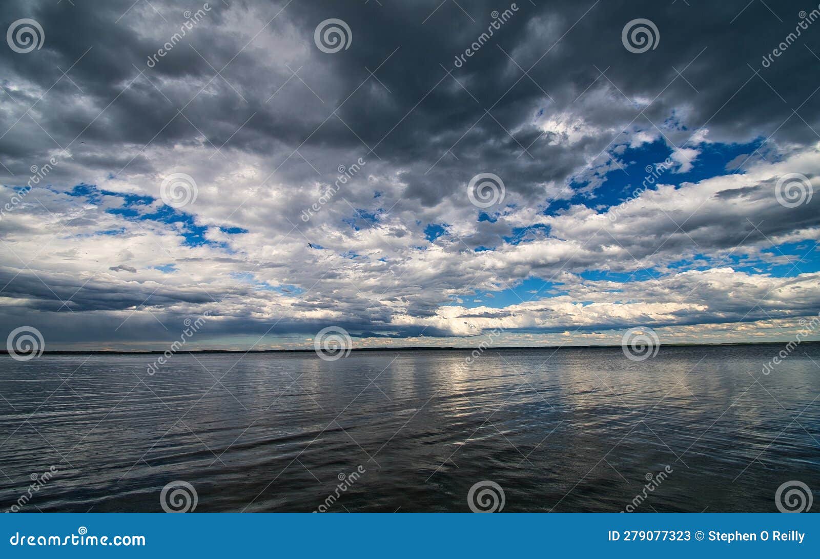 Dramatic Spring Storm Clouds Over the Lake Stock Image - Image of lake ...