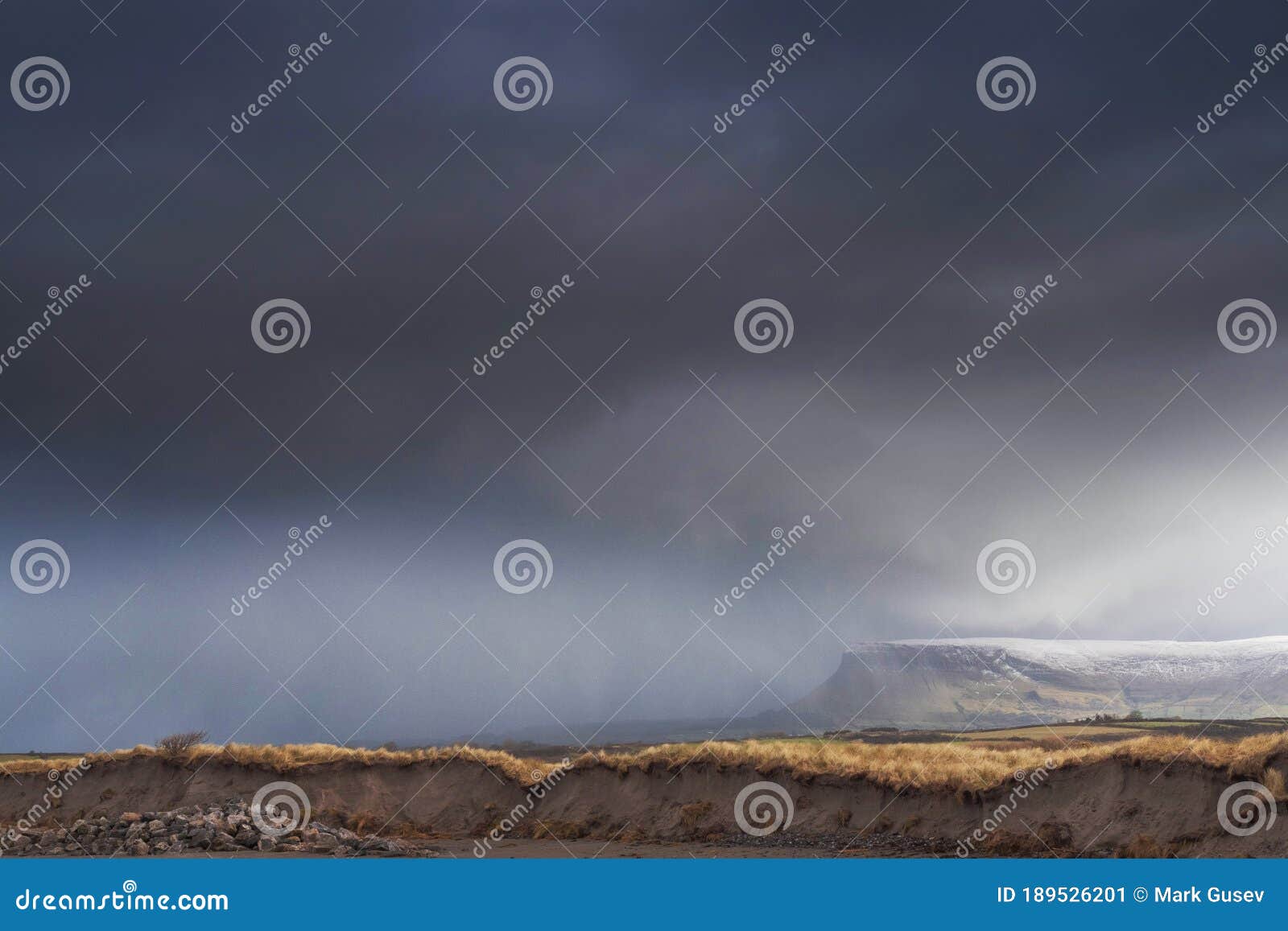 Dramatic Storm Clouds Over Benbulben Flat Top Mountain in County Sligo ...