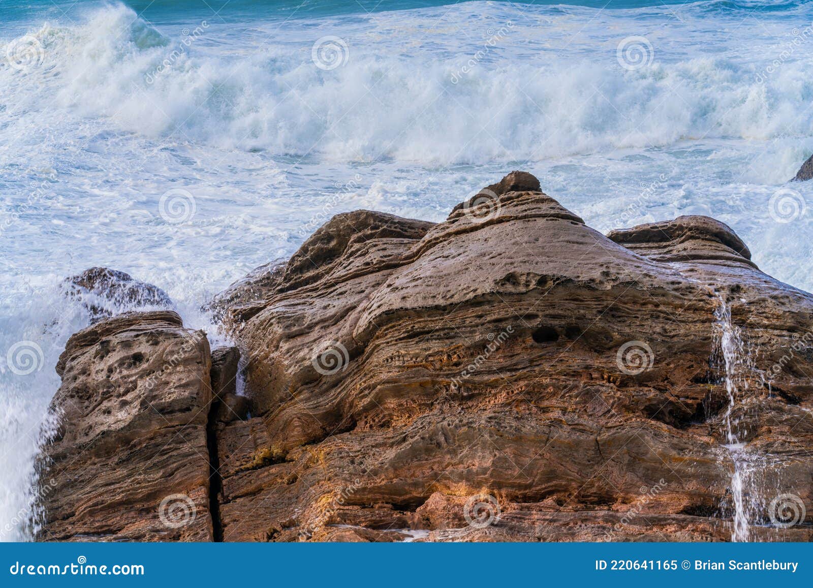 Dramatic Storm Waves Breaking and Surging Around Rock Stock Image ...