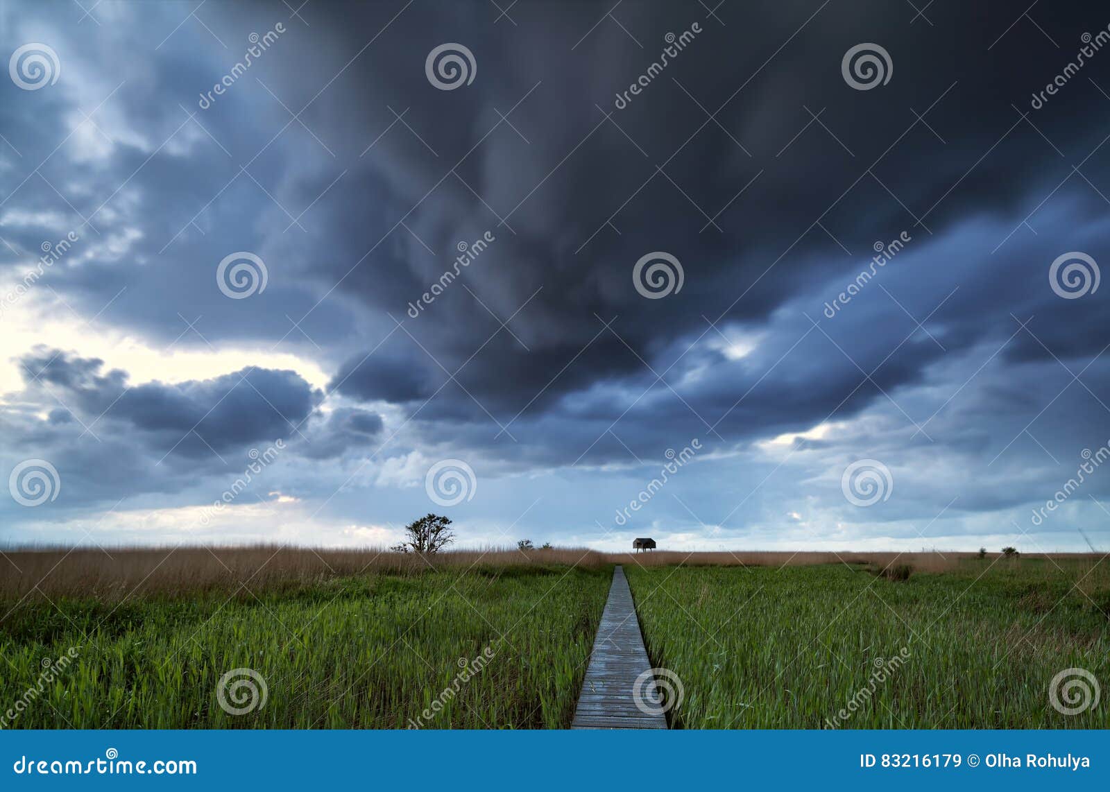 Dramatic Stormy Clouds Over Pier Path Stock Image - Image of cloudscape ...