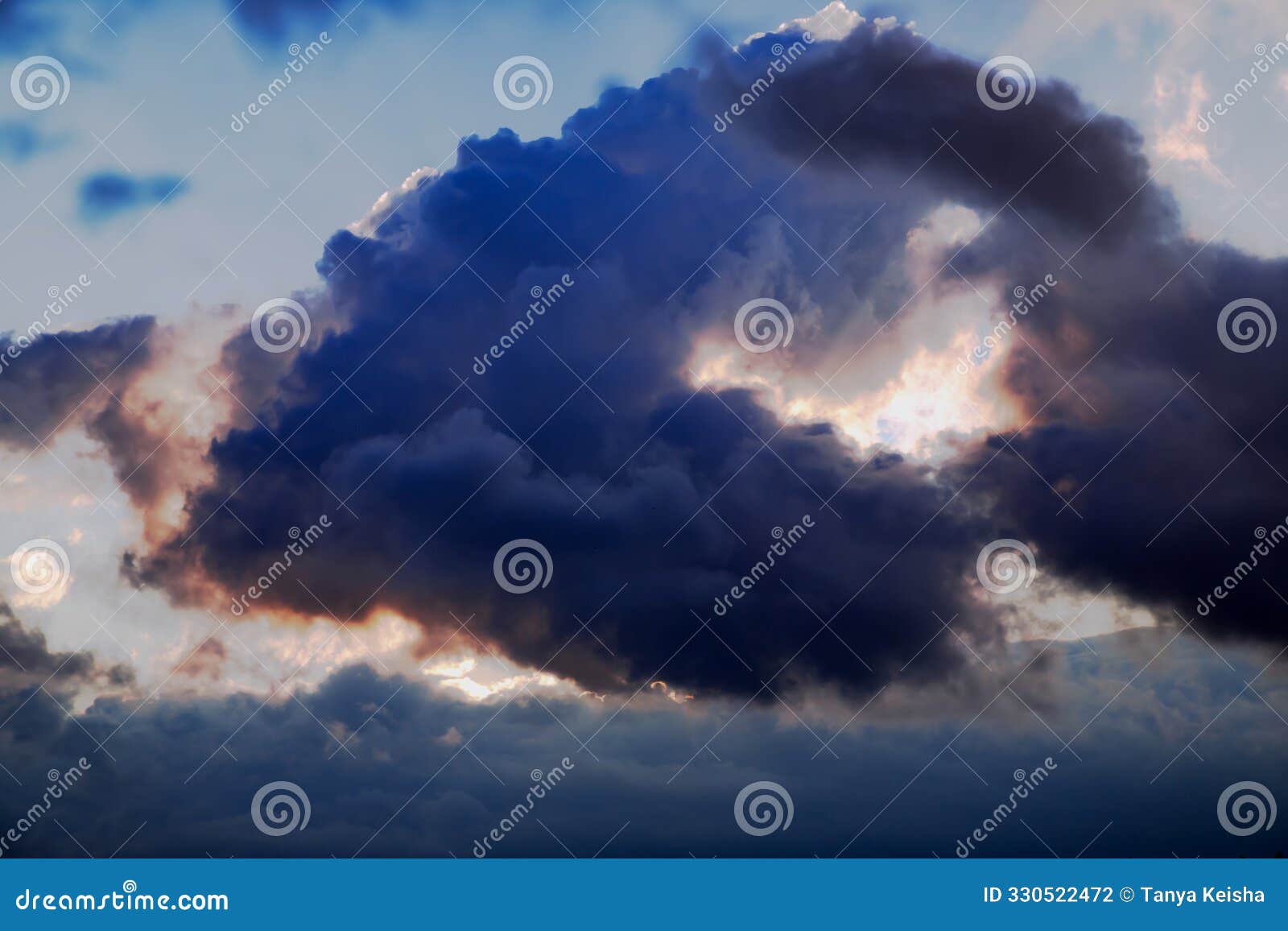 Dramatic Stormy Dark Cloudy Sky in Bright Rays of the Setting Sun at ...